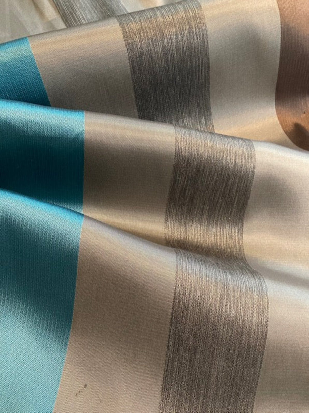 Turquoise /Grey/Chestnut Stripe. Stripes Running Across the Fabric
